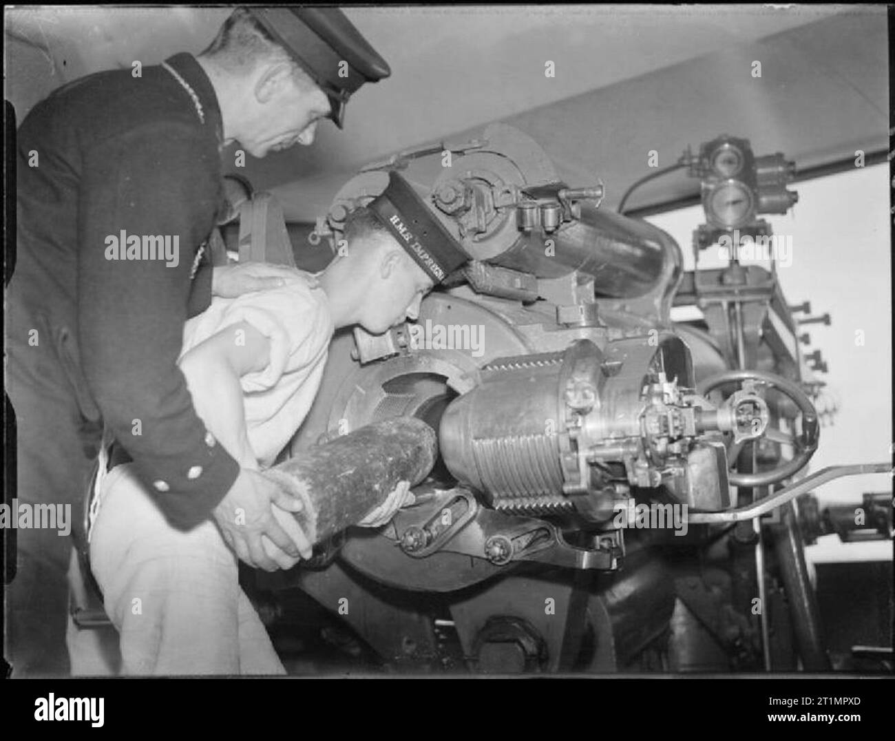The Royal Navy during the Second World War A naval rating recruit loads ...