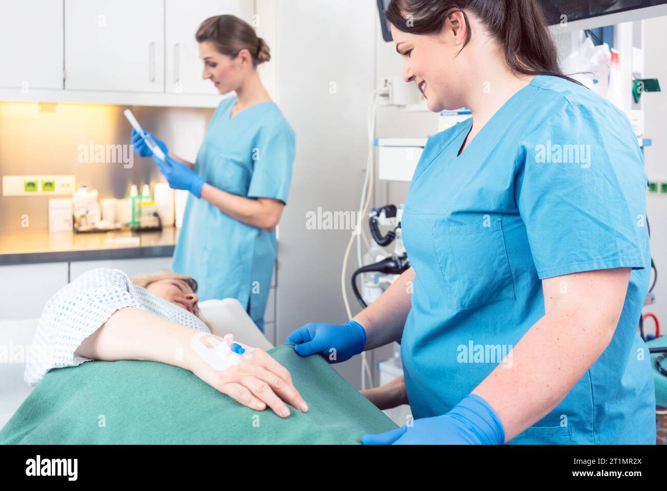 Nurses working in preparation of surgery Stock Photo - Alamy