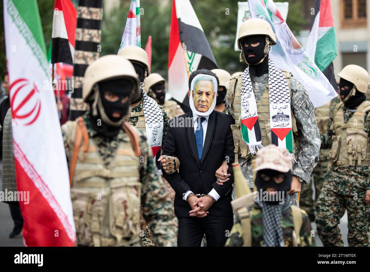 Tehran, Iran. 13th Oct, 2023. Iranian Basij paramilitary force members ...