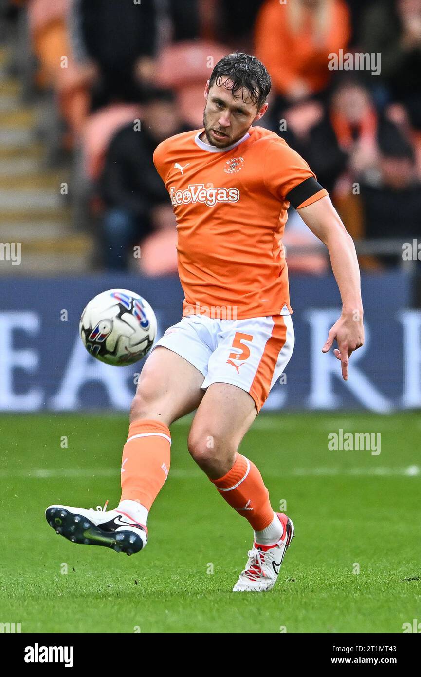 Matthew Pennington #5 of Blackpool passes the ball during the Sky Bet ...