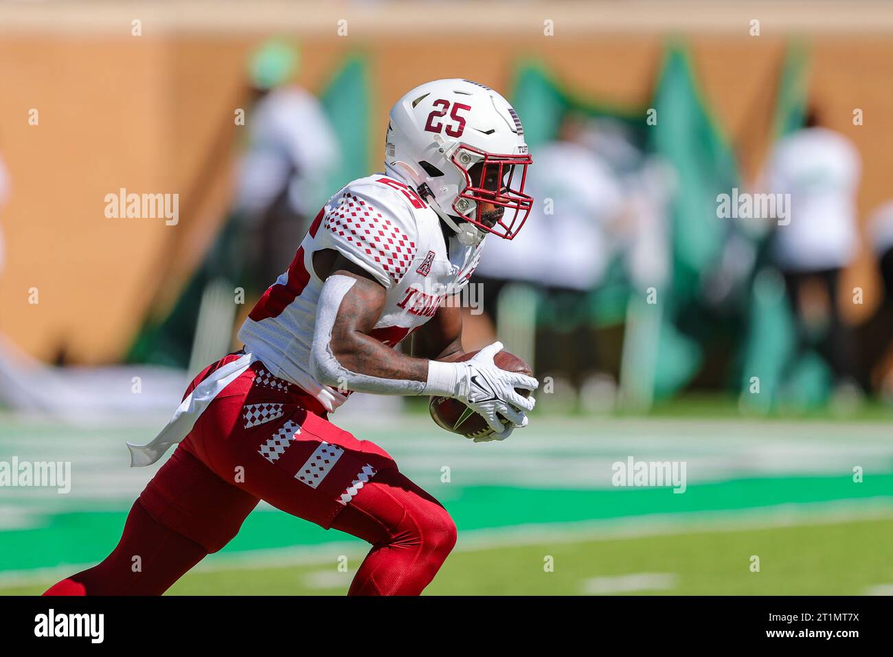 October 14, 2023:.Temple Owls safety Sam Martin (25) returns a kick-off ...