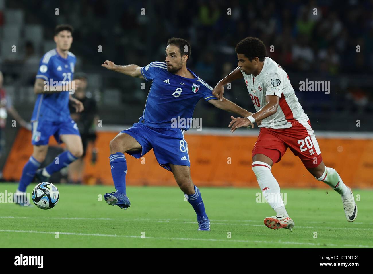 Italian's midfielder Giacomo Bonaventura challenges for the ball with ...