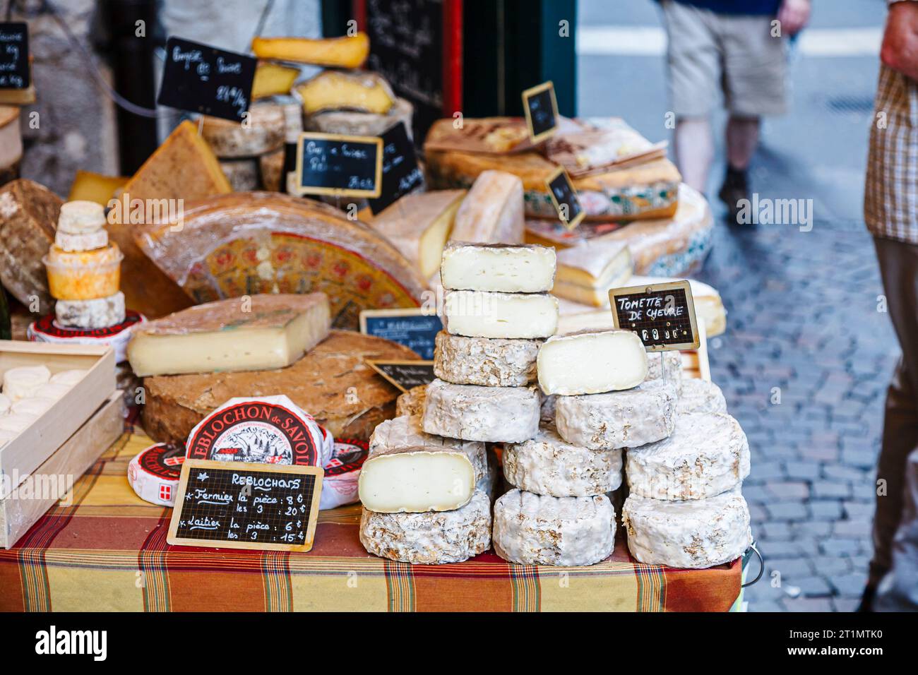 Cheese stall and display of local artisanal cheeses in an outside ...