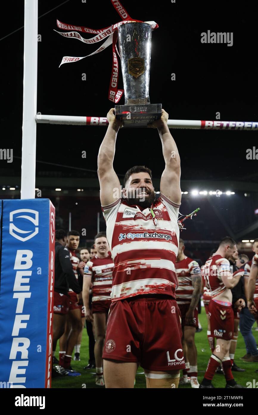 Wigan Warriors' Abbas Miski celebrates with their trophy during the ...