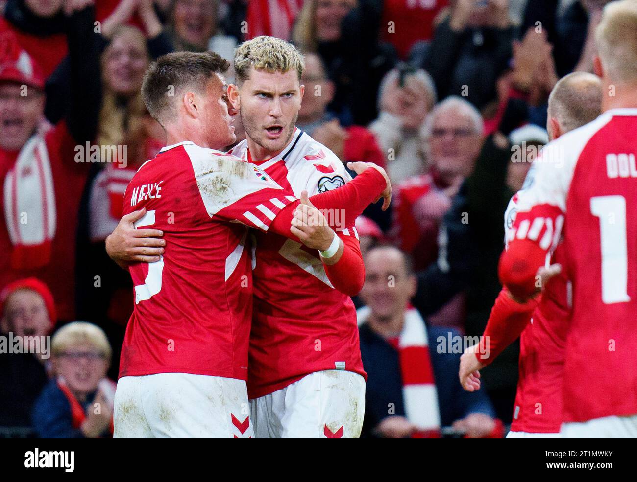 Jonas Wind scores 1-0 and celebrates with Joakim Maehle during the ...