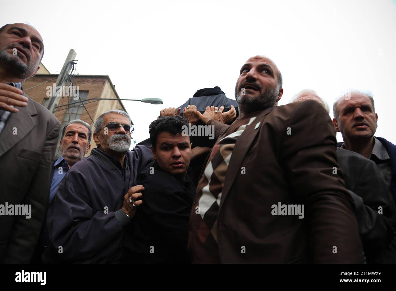 Tehran, Iran. 13th Oct, 2023. Iranian mourners attend a funeral ...