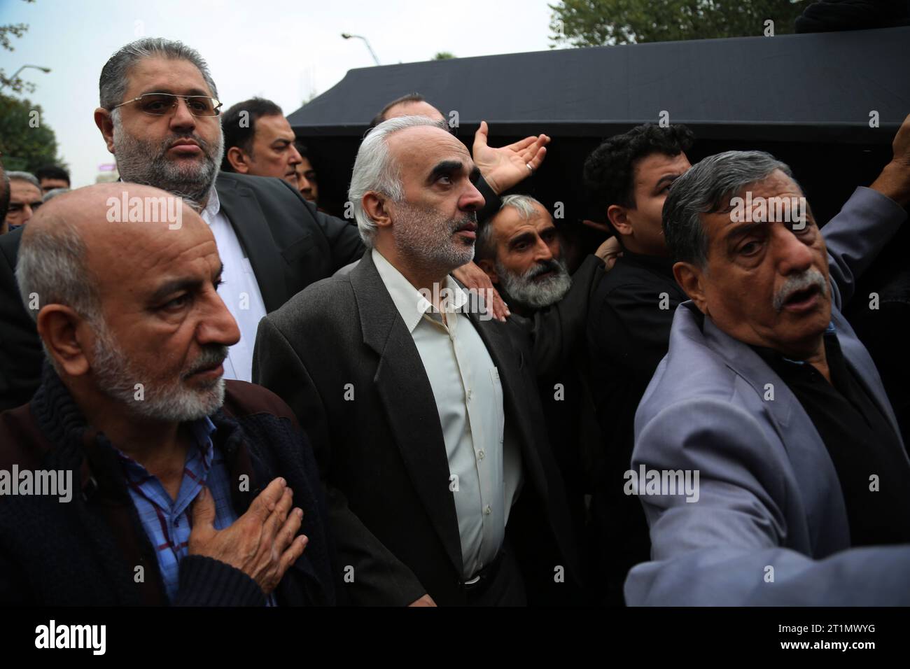 Tehran, Iran. 13th Oct, 2023. Iranian mourners attend a funeral ...