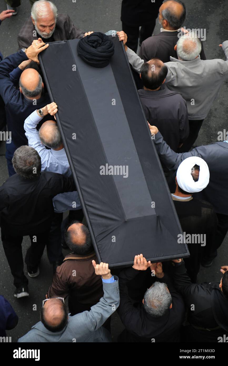 Tehran, Iran. 13th Oct, 2023. Iranian mourners attend a funeral ...