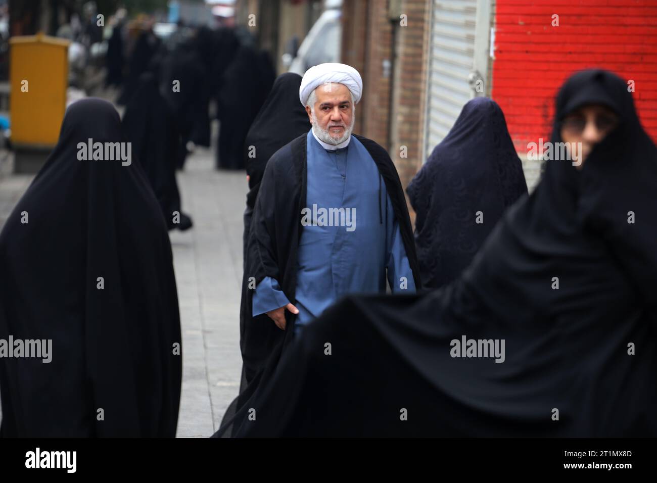 Tehran, Iran. 13th Oct, 2023. An Iranian cleric man attends a funeral ...