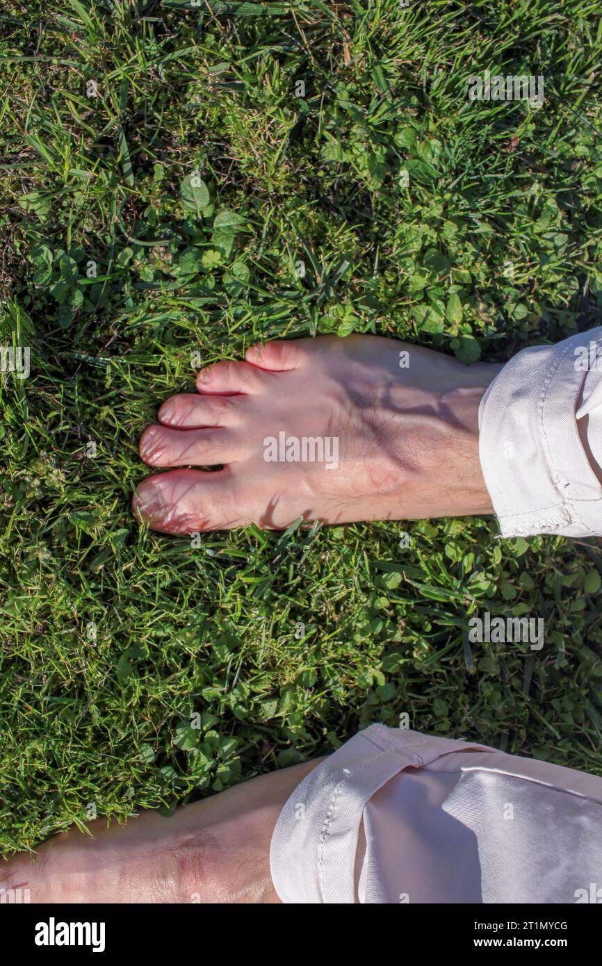 my feet on the ground in my garden. I love this sensation Stock Photo ...