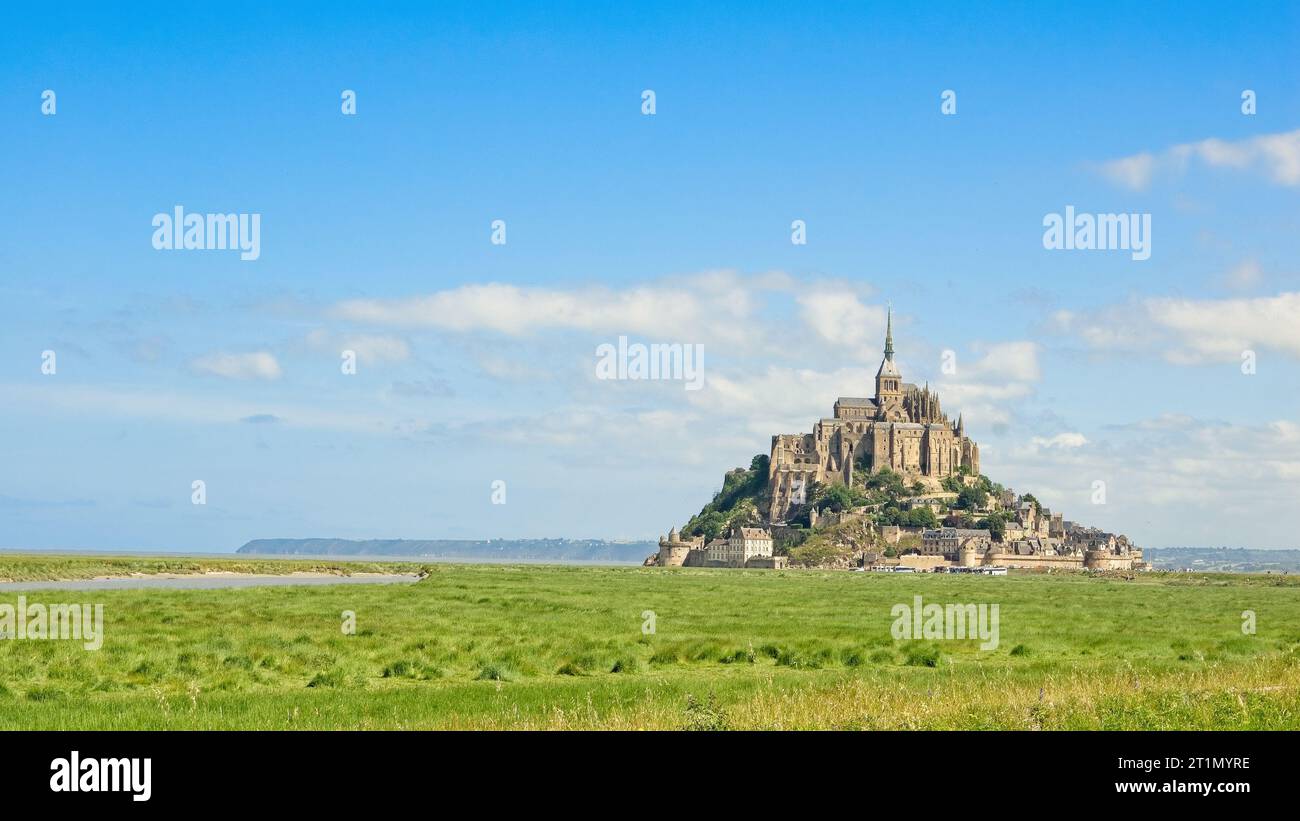 The medieval town of Mont Saint Michel built on a rock in the middle of ...
