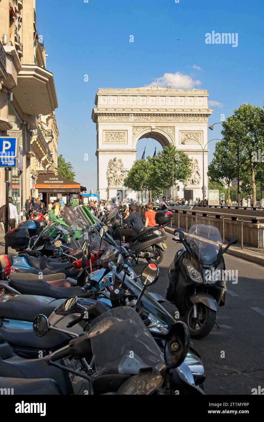 Paris, France — July 2028: Motorcycles line the sidewalk on Avenue de ...