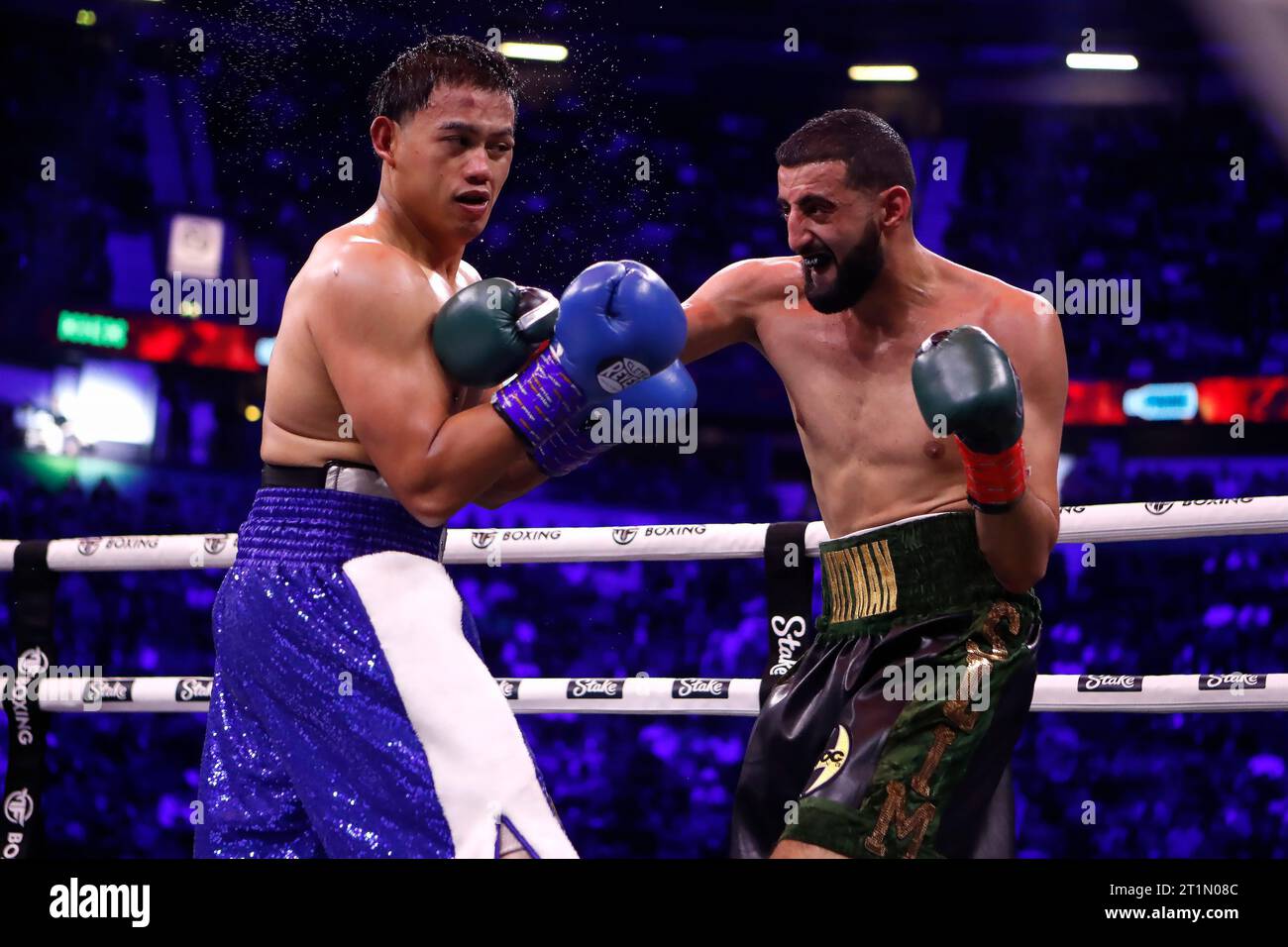 Slim (right) in action against salt papi during their middleweight bout ...