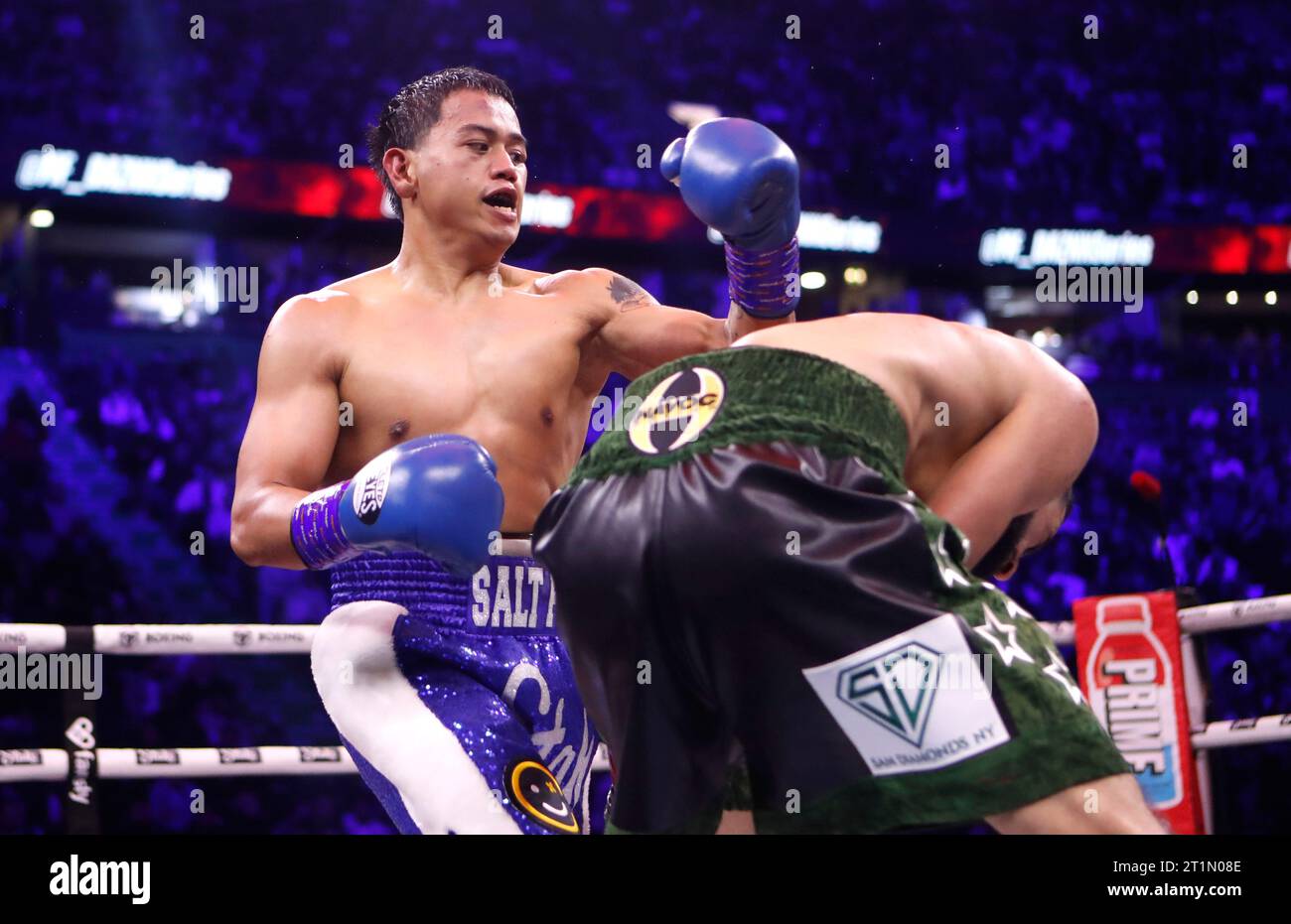 Slim (right) in action against Salt Papi during their middleweight bout ...
