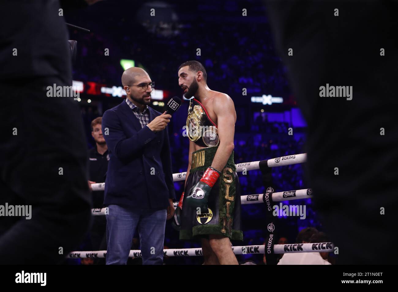 Slim reacts after beating Salt Papi during their middleweight bout ...