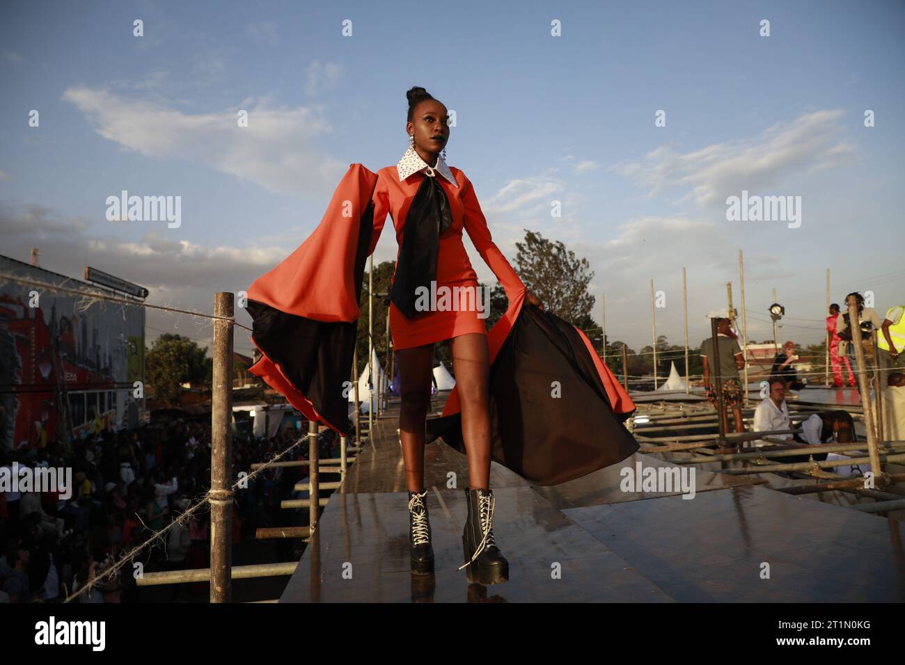 Nairobi, Kenya. 14th Oct, 2023. A model hits the runway at the Kibera ...