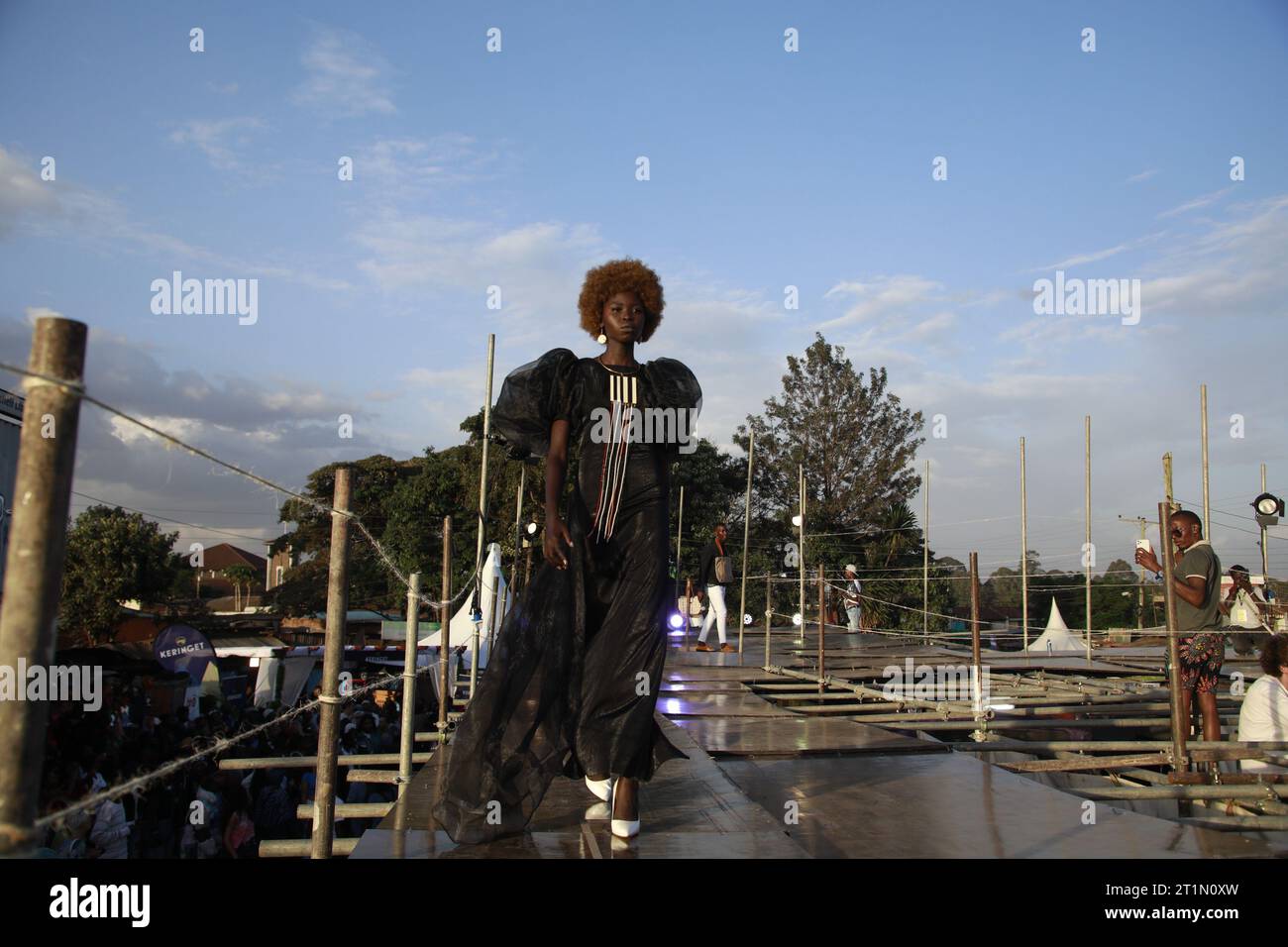 Nairobi, Kenya. 14th Oct, 2023. A model hits the runway at the Kibera ...