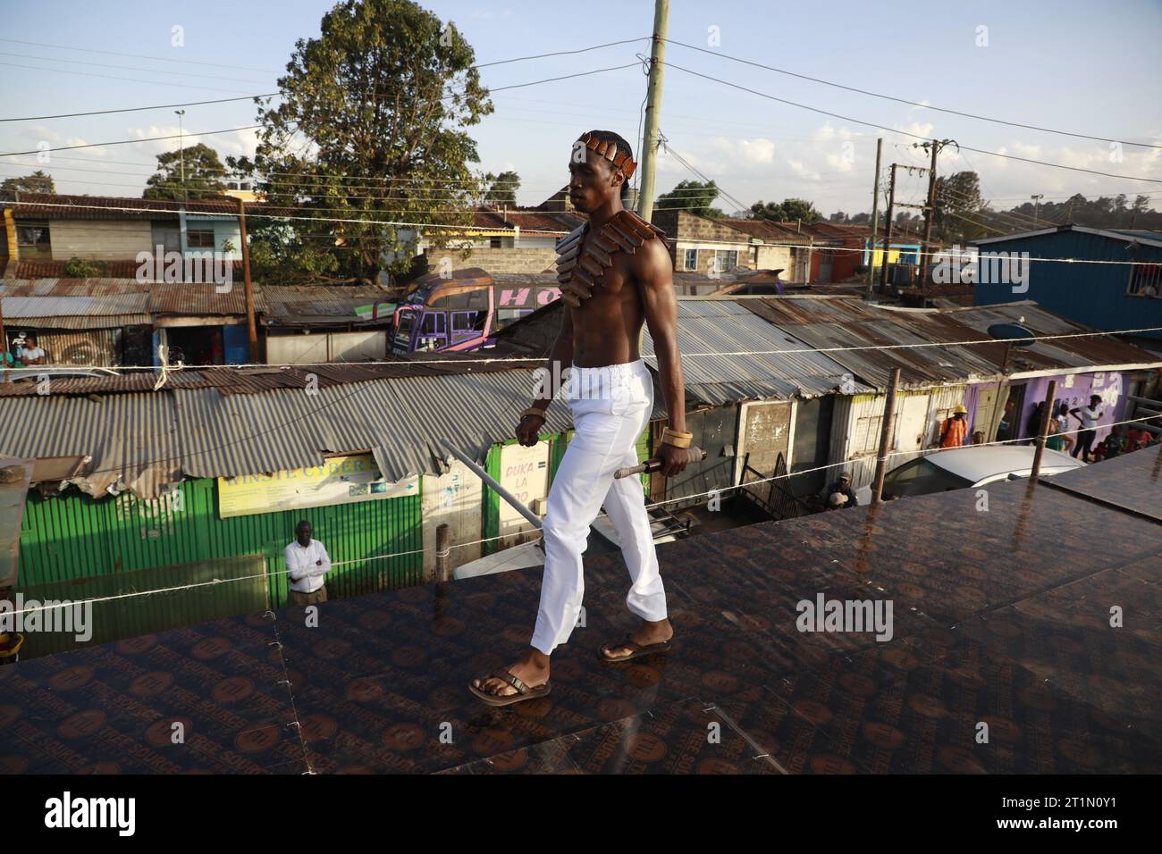 Nairobi, Kenya. 14th Oct, 2023. A model hits the runway at the Kibera ...