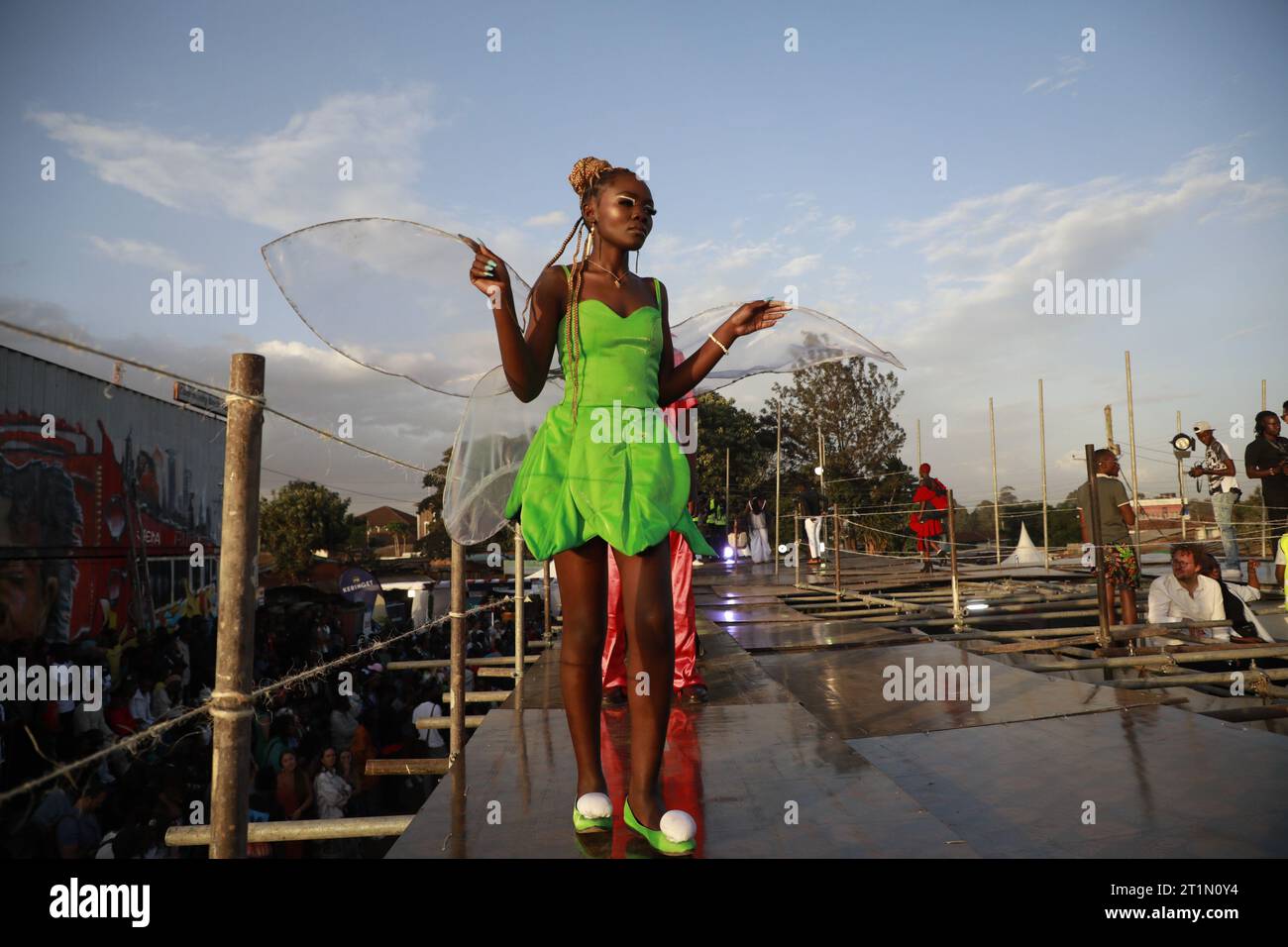 Nairobi, Kenya. 14th Oct, 2023. A model hits the runway at the Kibera ...