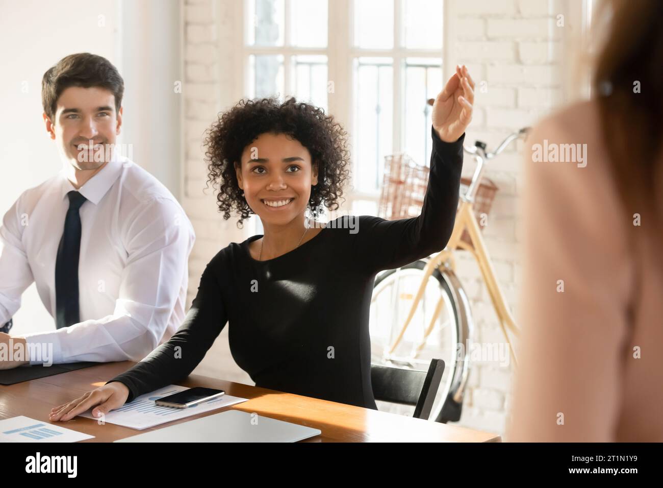 Business training African student girl asking question to speaker Stock ...