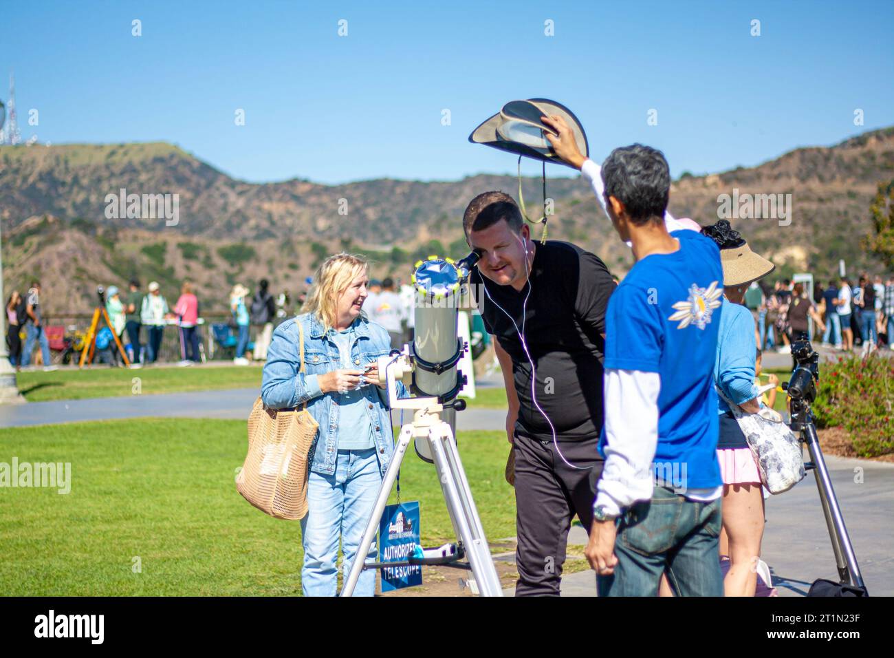 Watching the solar eclipse at Griffith Observatory Stock Photo - Alamy