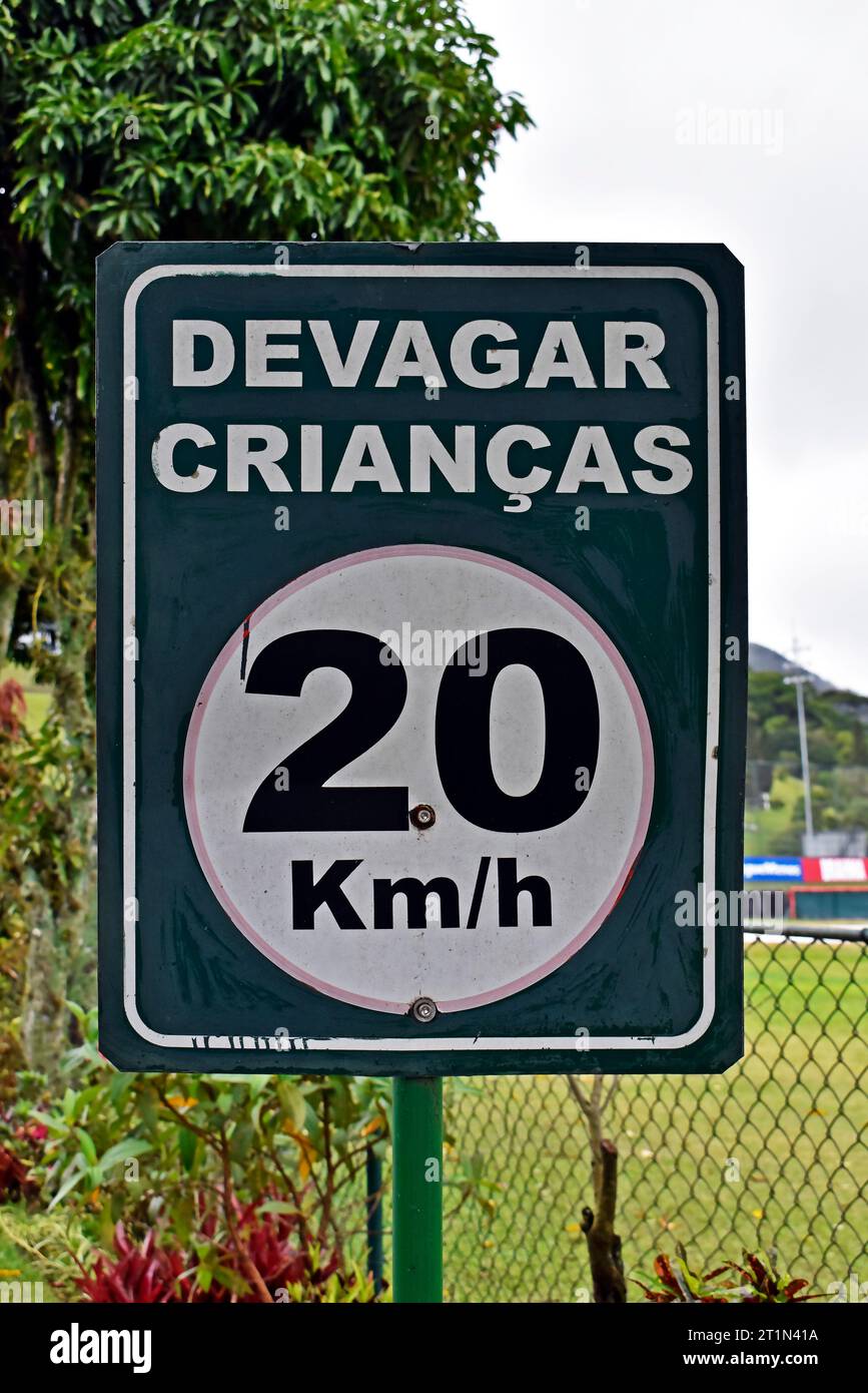 Traffic sign speed limit at 20 kilometers per hour with portuguese ...