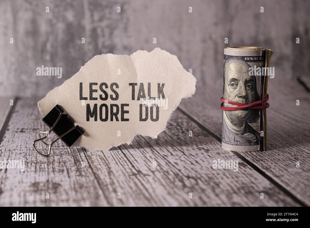 Less Talk more Do, written on a sticky note Stock Photo - Alamy