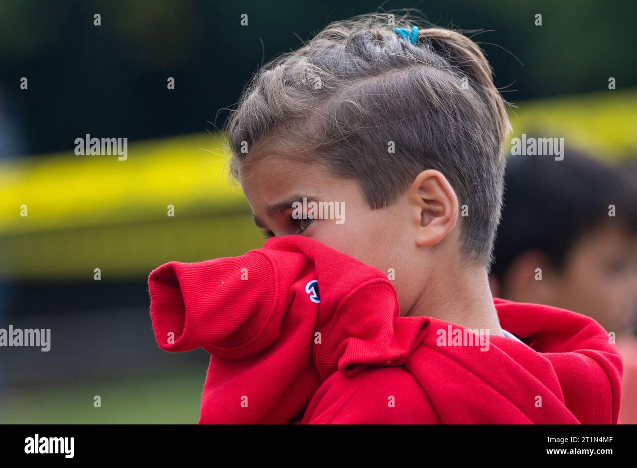 Vancouver, Canada. 14th Oct, 2023. A young boy covers his face from the ...