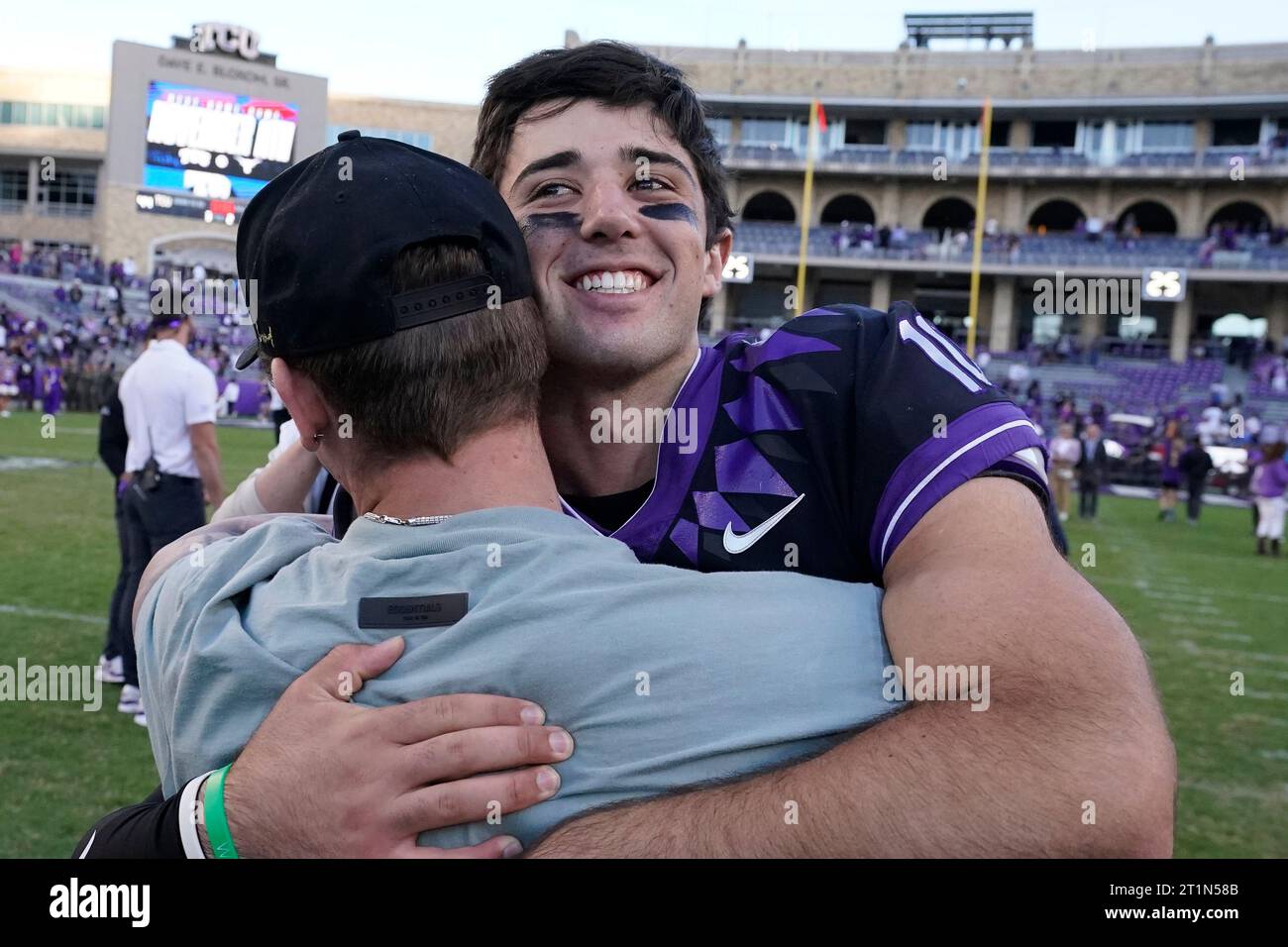 TCU quarterback Josh Hoover, right, gets a hug after winning an NCAA ...