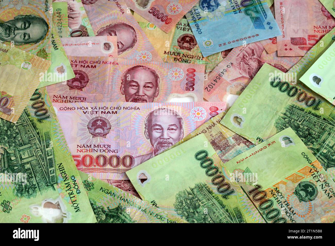 Vietnamese money (Dong) randomly spread. Vietnam is one of Asia's ...