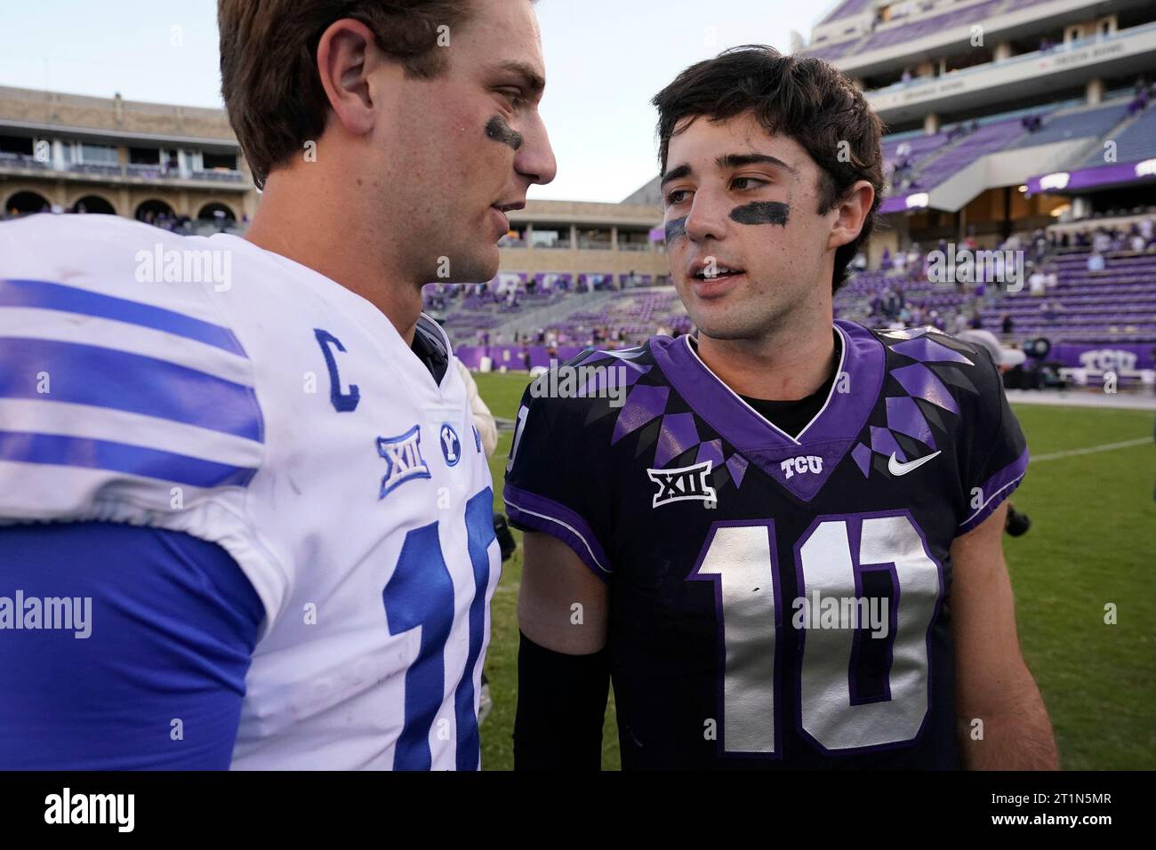TCU quarterback Josh Hoover, right, talks with BYU quarterback Kedon ...