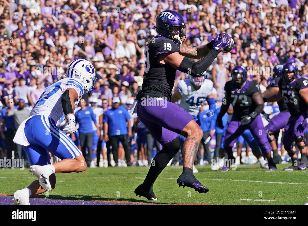 TCU tight end Jared Wiley (19) catches a touchdown pass against BYU ...