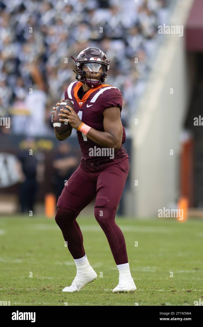 Lane Stadium Blacksburg, VA, USA. 14th Oct, 2023. Virginia Tech Hokies quarterback Kyron Drones ...