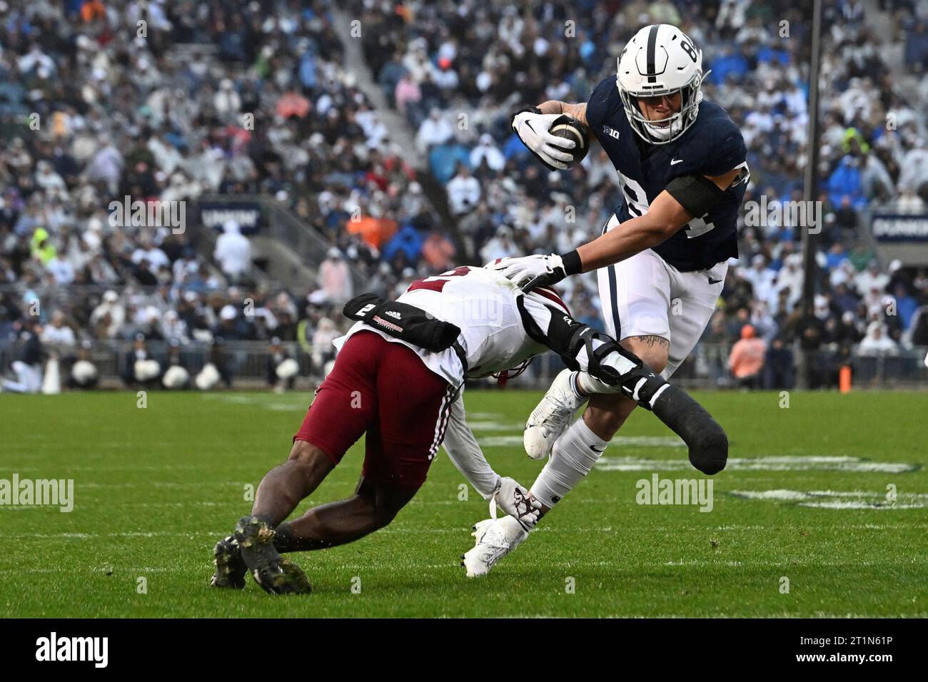Penn State tight end Theo Johnson (84) eludes Massachusetts safety ...
