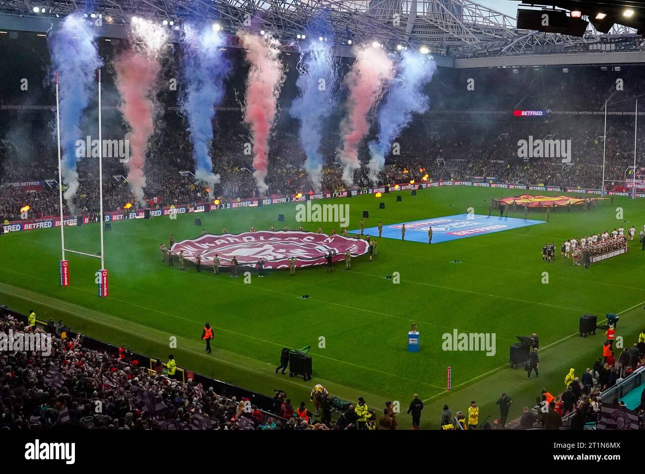 The players walk out to pyrotechnics before the Betfred Super League ...