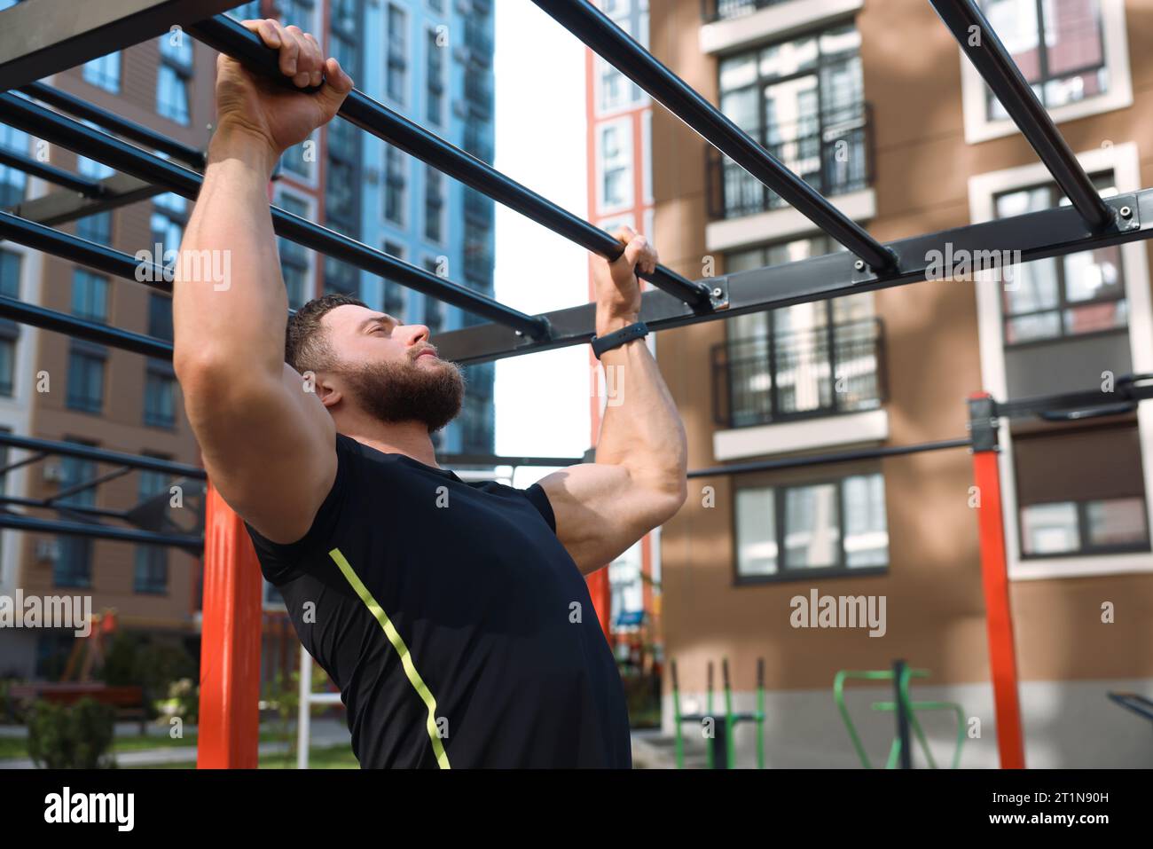 Man monkey bars hi-res stock photography and images - Alamy