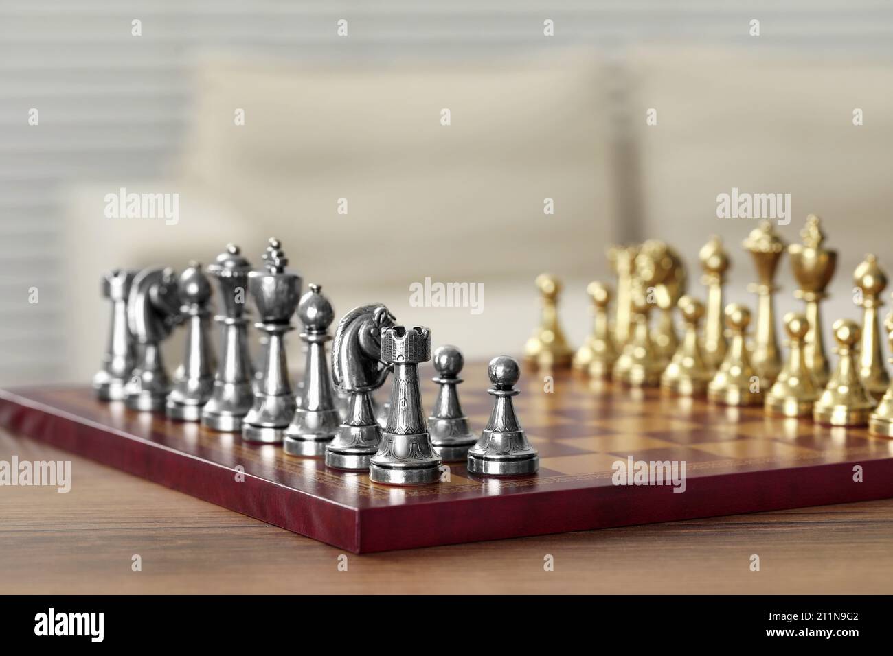 Set of chess pieces on checkerboard before game, selective focus. Space ...
