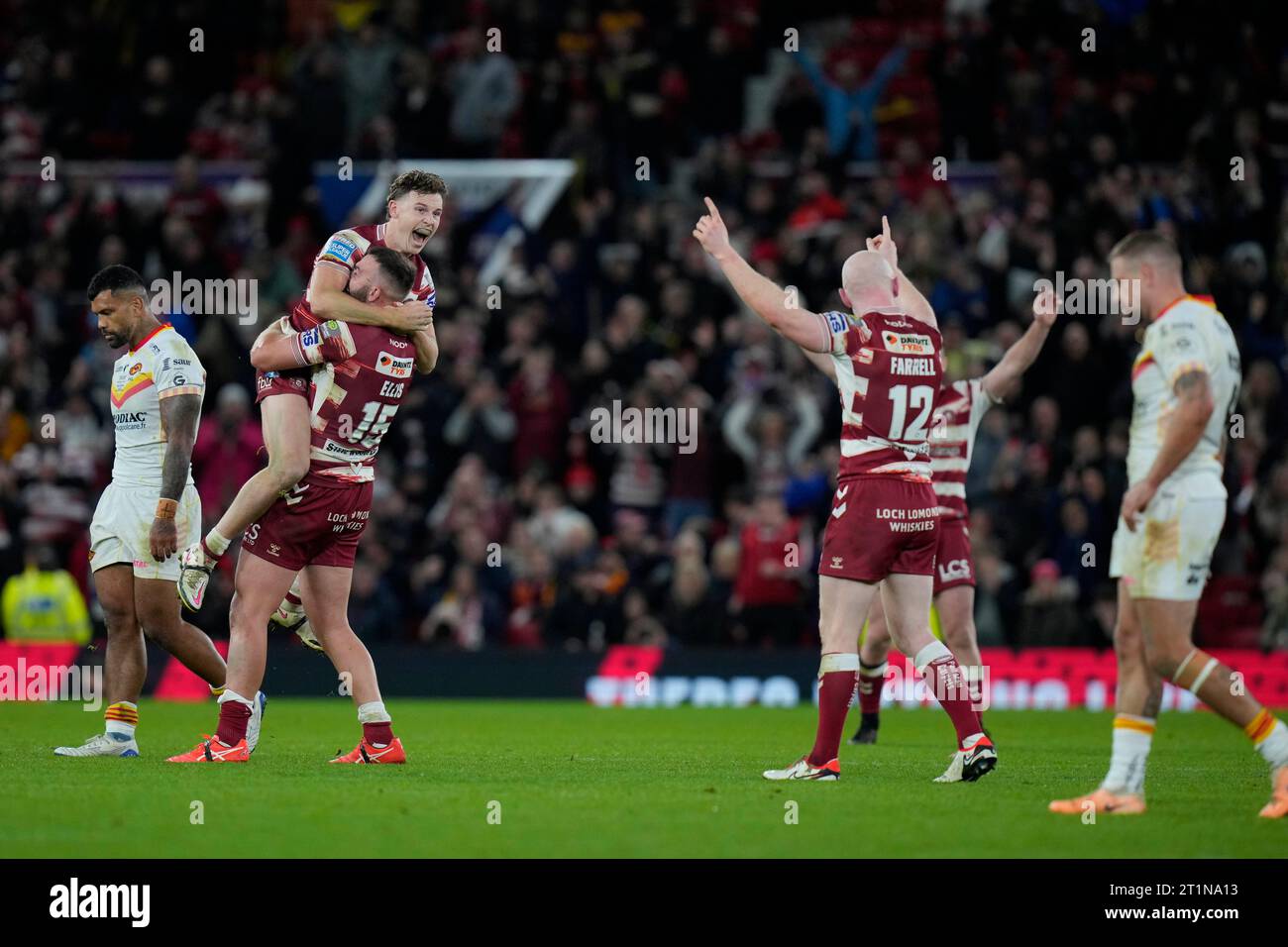 Jai Field #1 of Wigan Warriors celebrates with Kaide Ellis #15 of Wigan ...