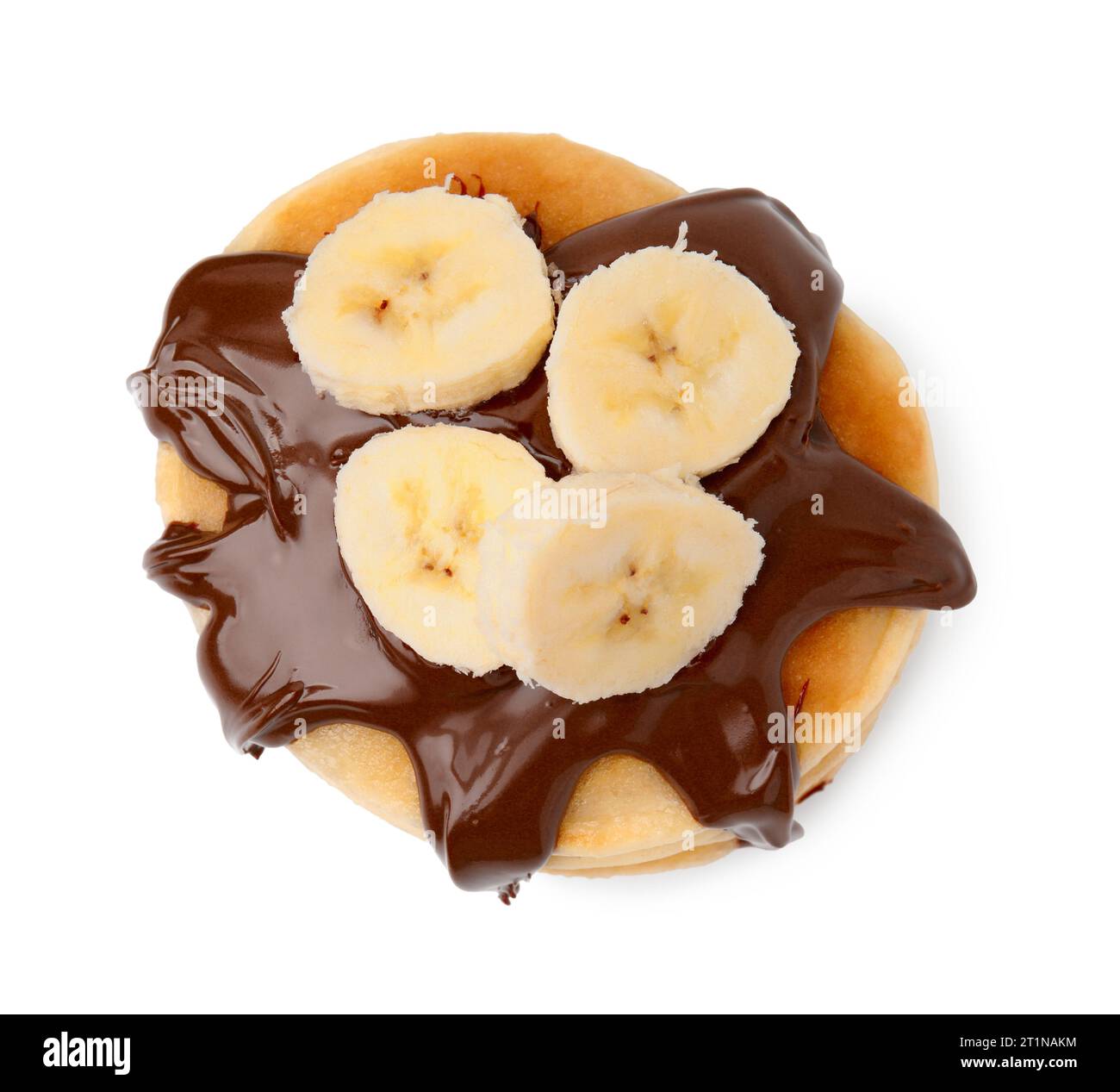Tasty pancake with chocolate spread and banana slices isolated on white ...