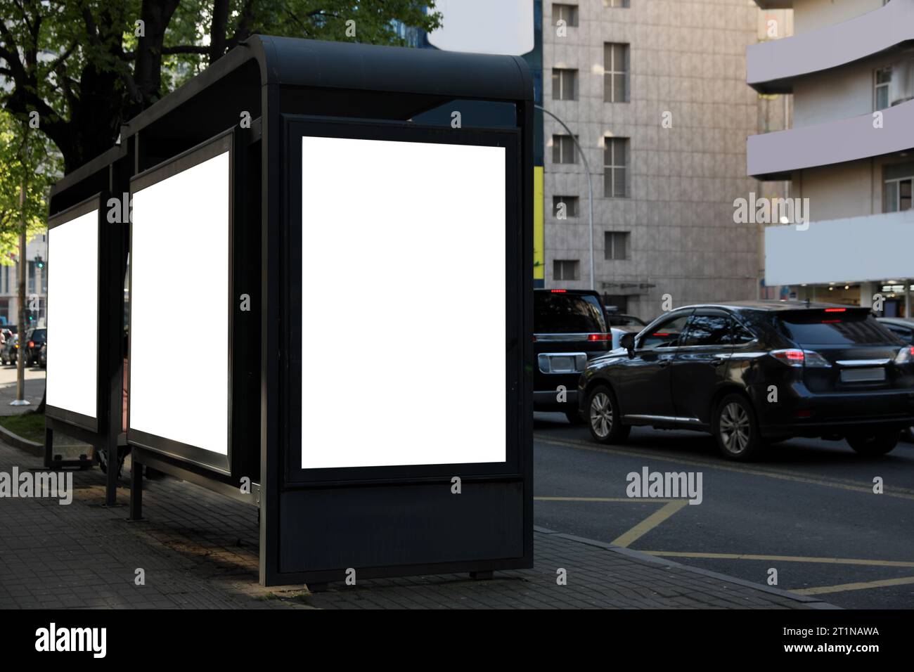 Bus stop with empty signboards in city. Mock-up for design Stock Photo ...