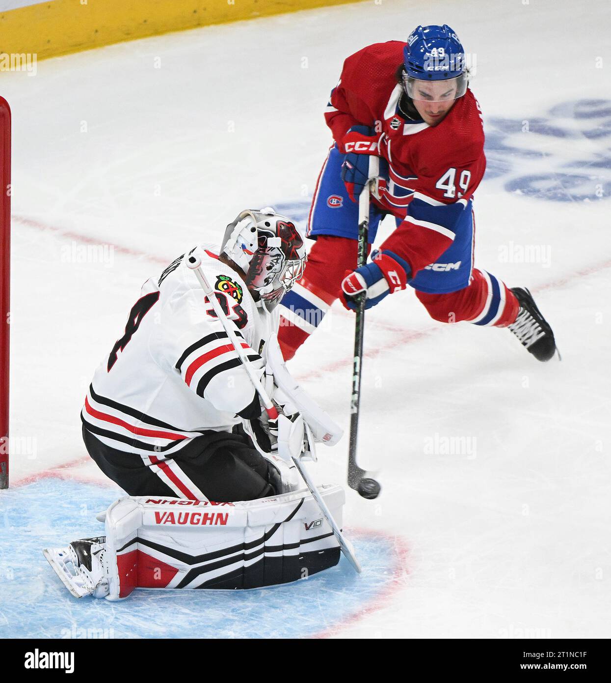 Montreal Canadiens' Rafael Harvey-Pinard (49) moves in on Chicago ...