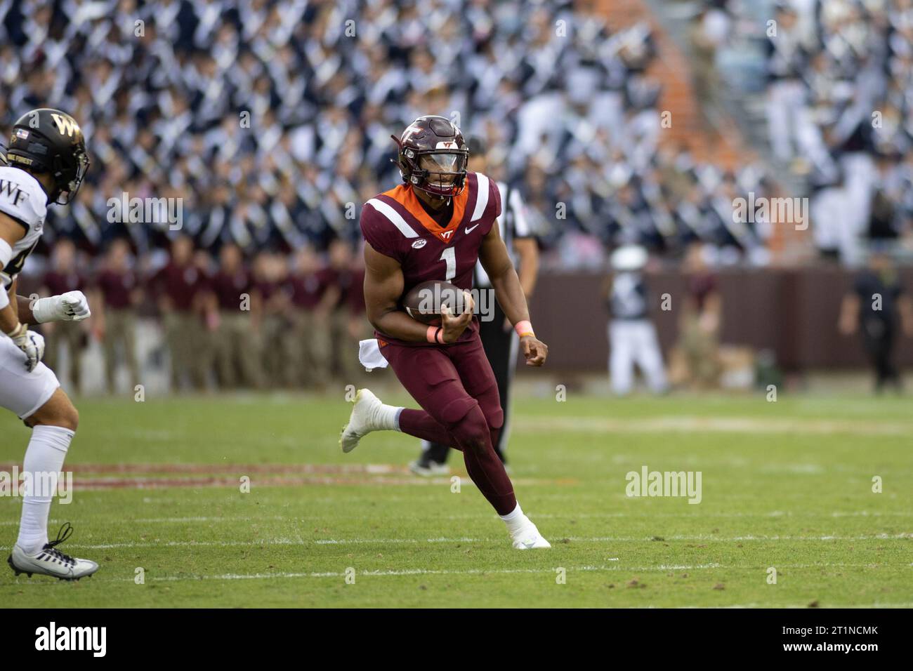 Lane Stadium Blacksburg, VA, USA. 14th Oct, 2023. Virginia Tech Hokies quarterback Kyron Drones ...