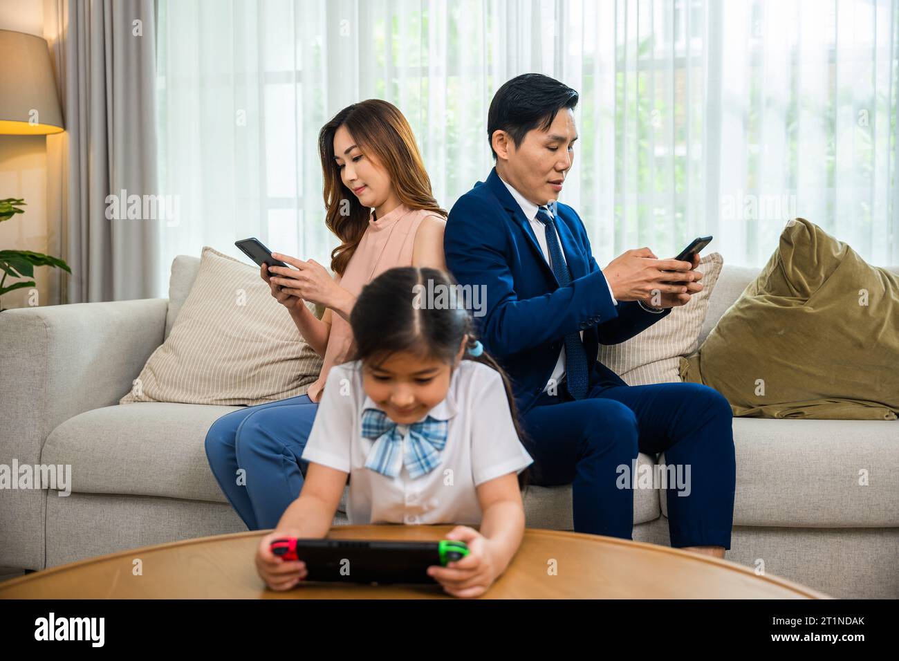 Parents ignore child hi-res stock photography and images - Alamy