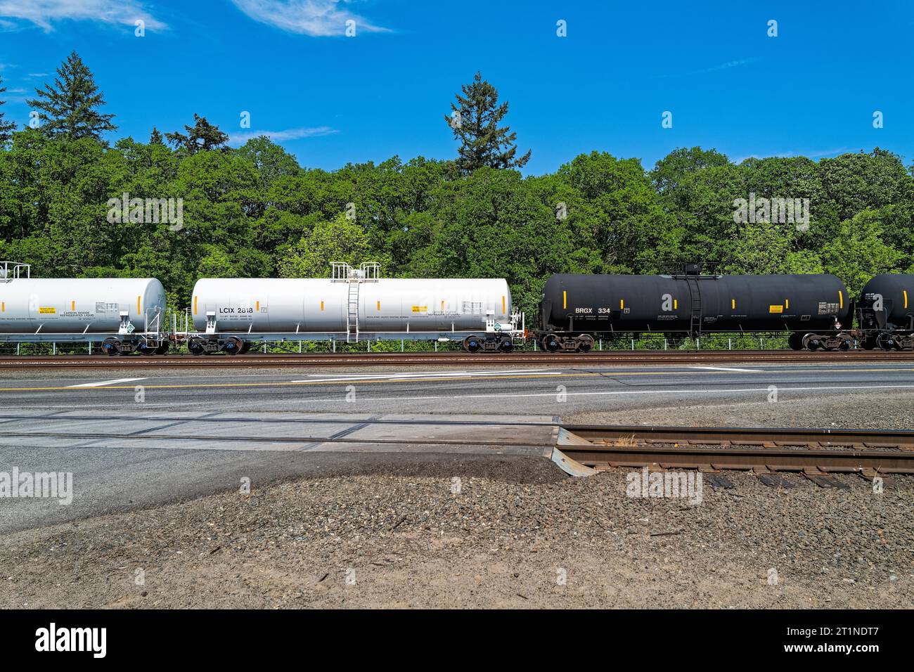 Tank cars on a moving freight train in Kalama, Washington, USA Stock ...