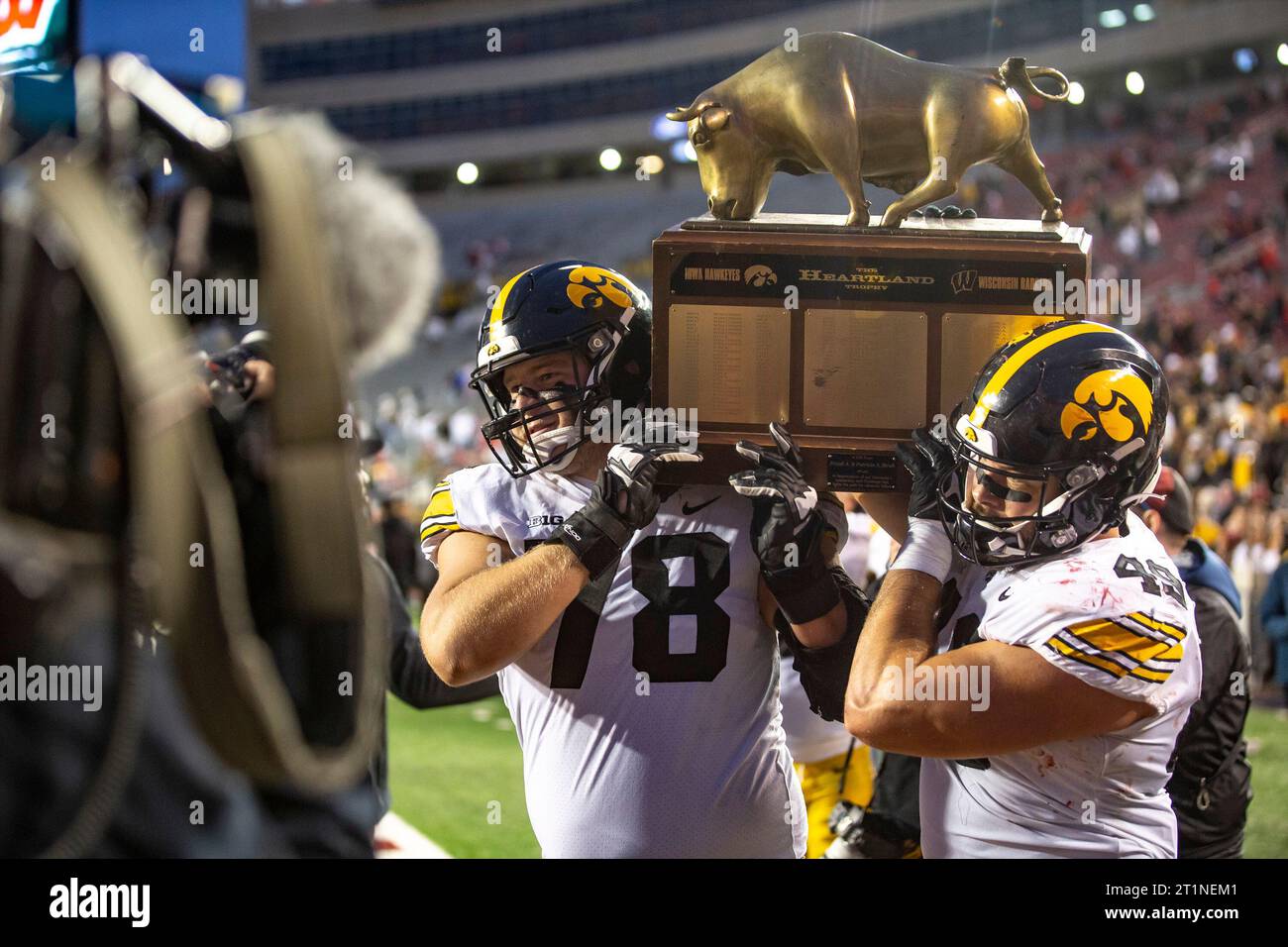 Iowa offensive lineman Mason Richman (78) and defensive lineman Ethan ...