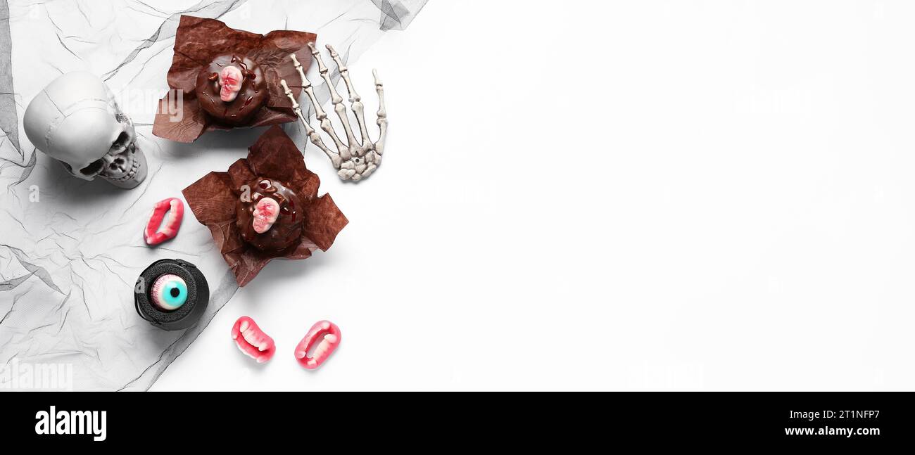 Delicious chocolate cakes, candies, skull and skeleton hand for ...