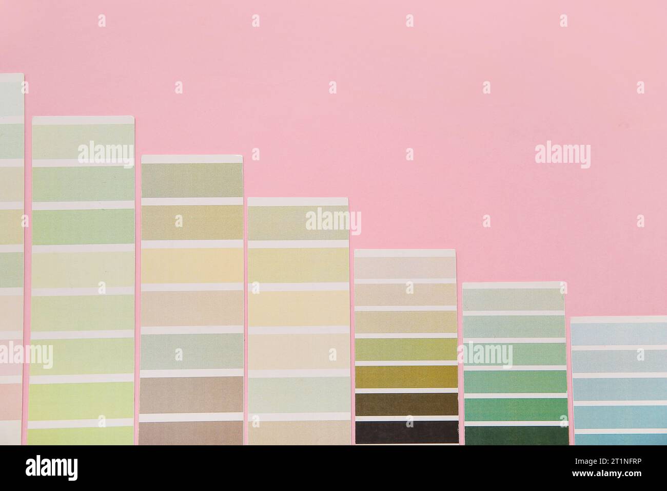Many color palettes on pink background Stock Photo - Alamy