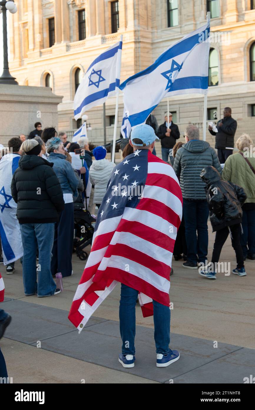 St. Paul, Minnesota. People of all ages gather at the state capitol to ...