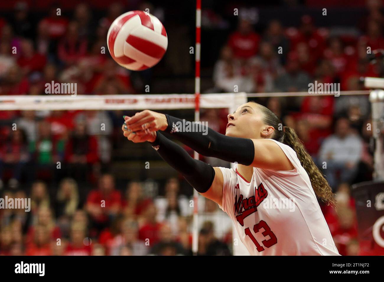 Nebraska's Merritt Beason hits the ball during the third set of an NCAA ...