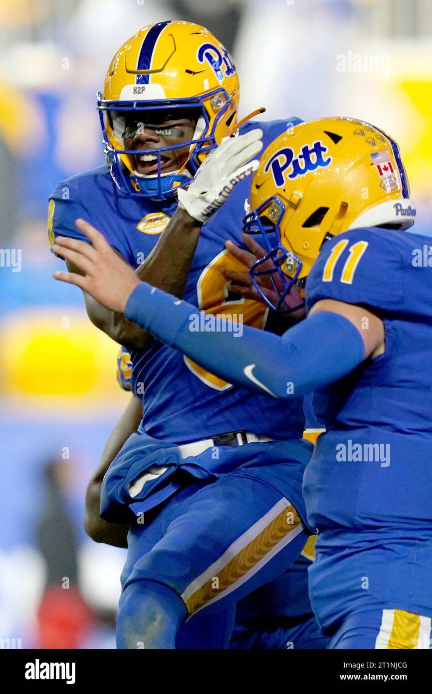 Pittsburgh quarterback Christian Veilleux (11) celebrates a touchdown ...